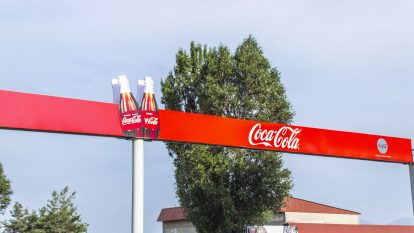 Promotional Sign for Coca-Cola displayed above the road | Front Signs