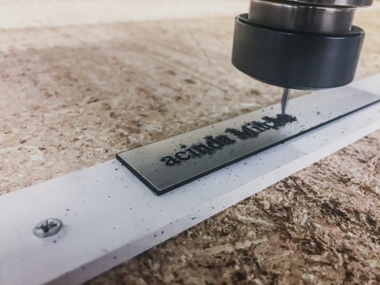 Engraving process on a durable dibond material | Front Signs