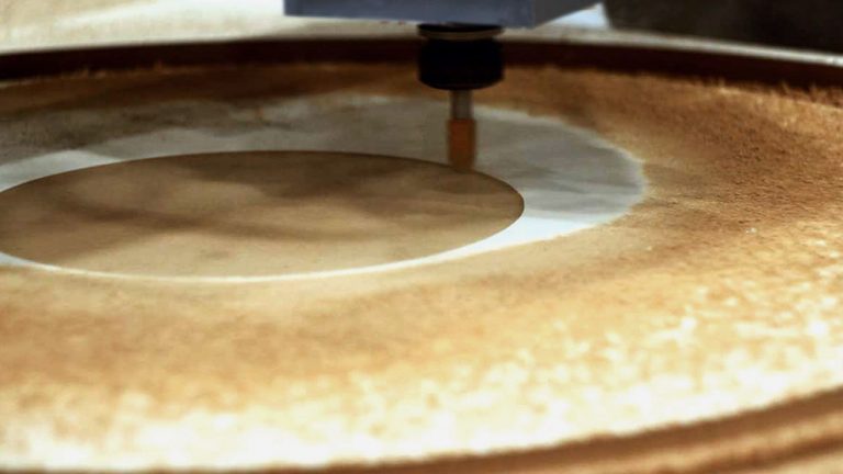 Wood engraving process from a close angle | Front Signs