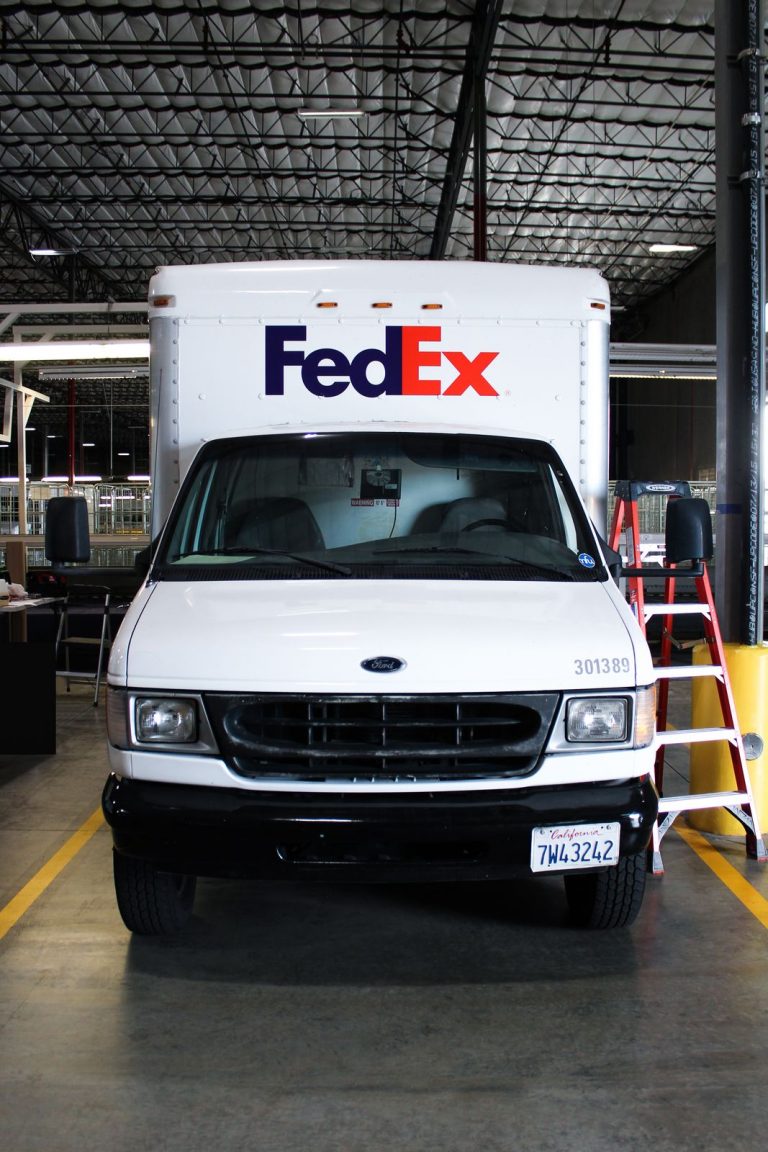 Vinyl lettering for fedex truck branding | Front Signs