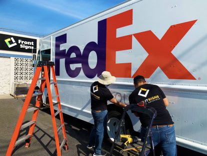 Fedex vehicle fleet graphics installation process | Front Signs