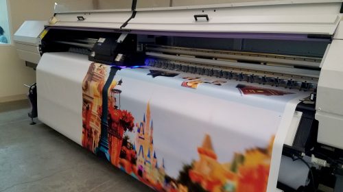 In-house large format printing process of a banner | Front Signs
