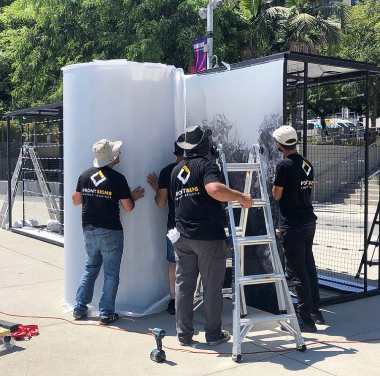 Installation process of a large lightbox signage | Front Signs