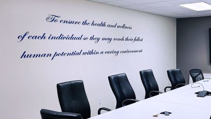 Office meeting room branding with vinyl lettering | Front Signs
