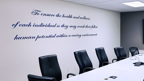 Office meeting room branding with vinyl lettering | Front Signs