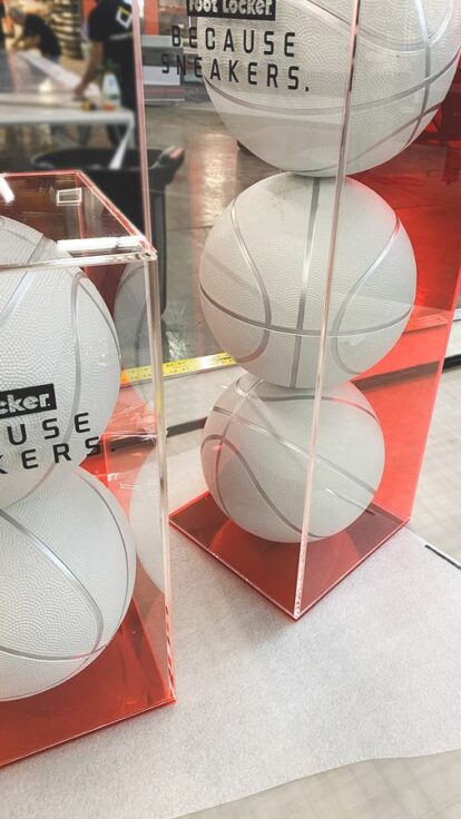 Foot Locker custom acrylic pedestals with basketballs | Front Signs