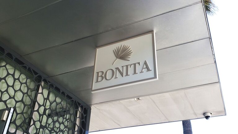 Bonita storefront branding with an awning aluminum sign | Front Signs