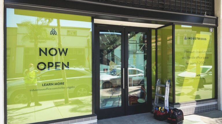 Industrious storefront branding with custom decals | Front Signs
