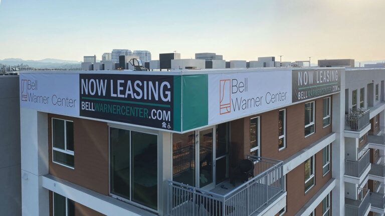 Bell Warner Center high rise vinyl banners | Front Signs