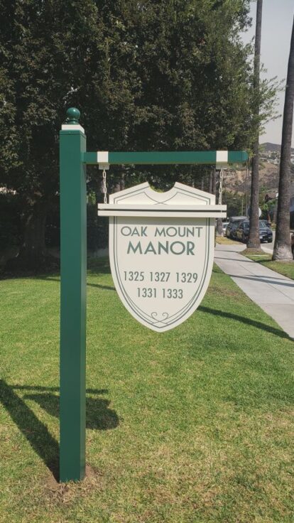 Oak Mount Manor hanging real estate sign | Front Signs