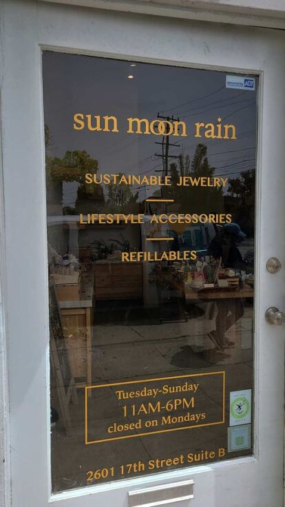 Sun Moon Rain vinyl lettering for storefront branding | Front Signs