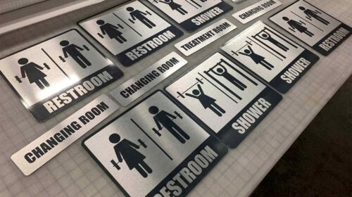 Restroom signs made of aluminum and vinyl lettering | Front Signs