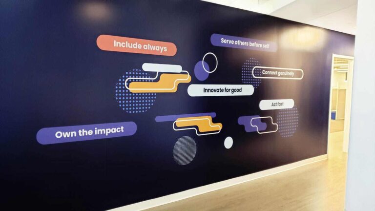 Custom office signage made of opaque vinyl | Front Signs