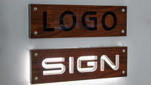 Illuminated black and white wooden logo signs | Front Signs