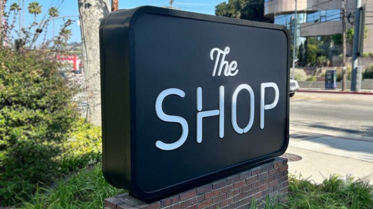 The Shop outdoor sign face replacement for branding | Front Signs