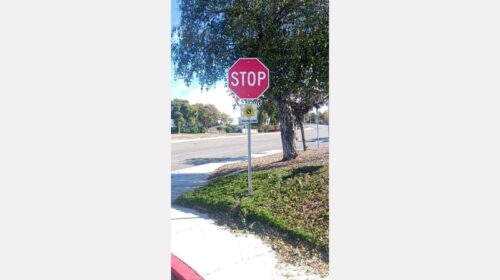 Regulatory road sign installation by our crew | Front Signs
