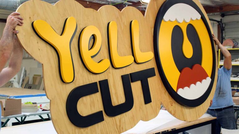 Acrylic and wooden logo sign for Yell Cut | Front Signs